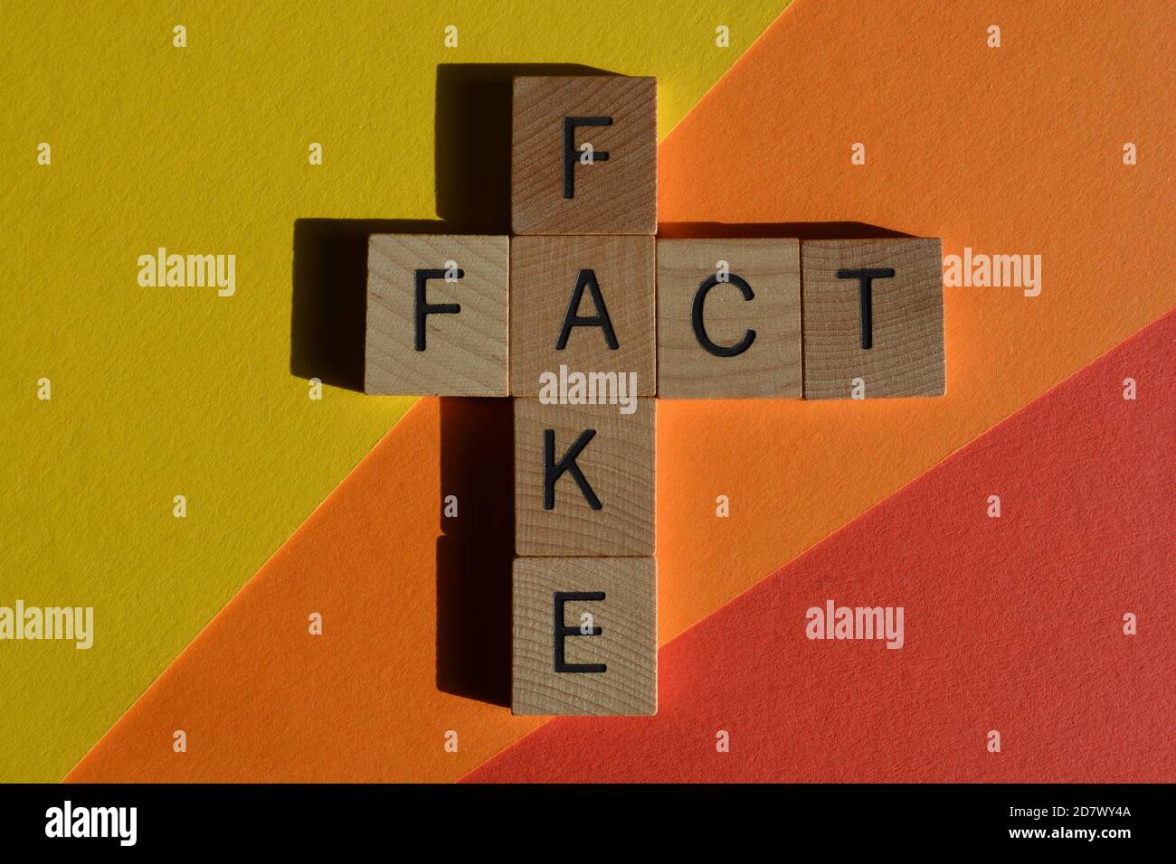 Fact, Fake, words in wooden alphabet letters in crossword form isolated ...