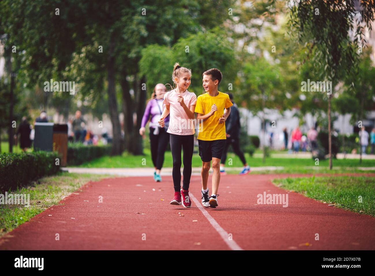 Kids run. Healthy sport. Child sport, heterosexual twins running on ...