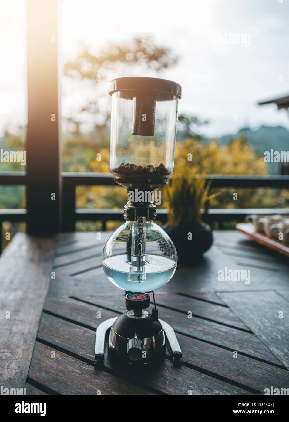 Vacuum retro coffee maker with beatiful view background Stock Photo - Alamy