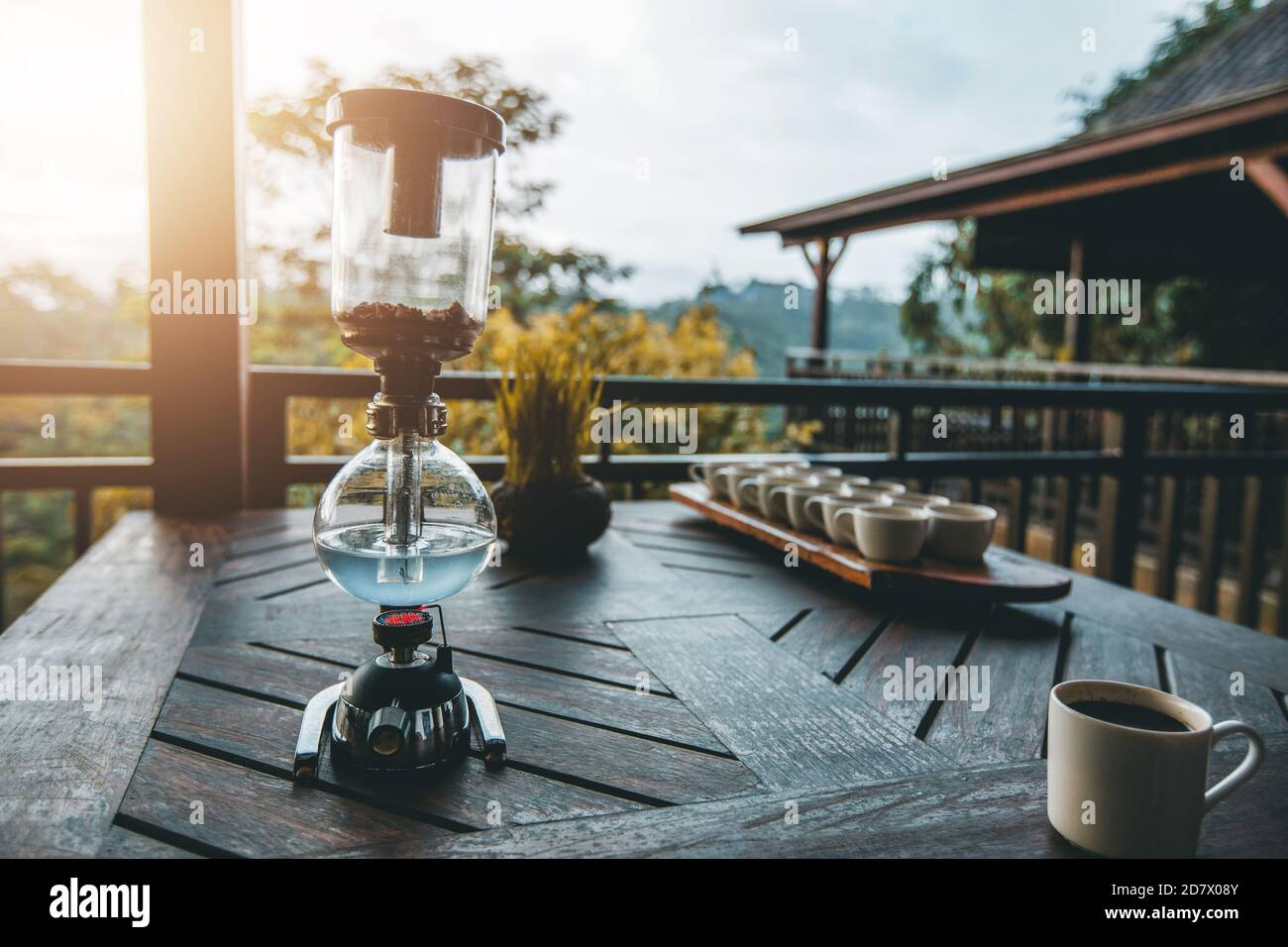 Vacuum retro coffee maker with beatiful view background Stock Photo - Alamy