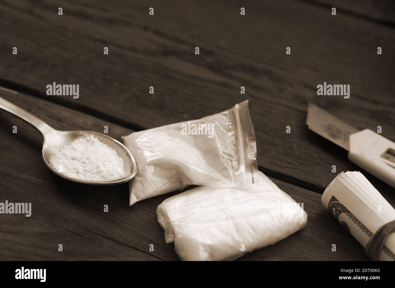 Drug dealer stuff. Lighter paper knife and spoon full of white powder ...