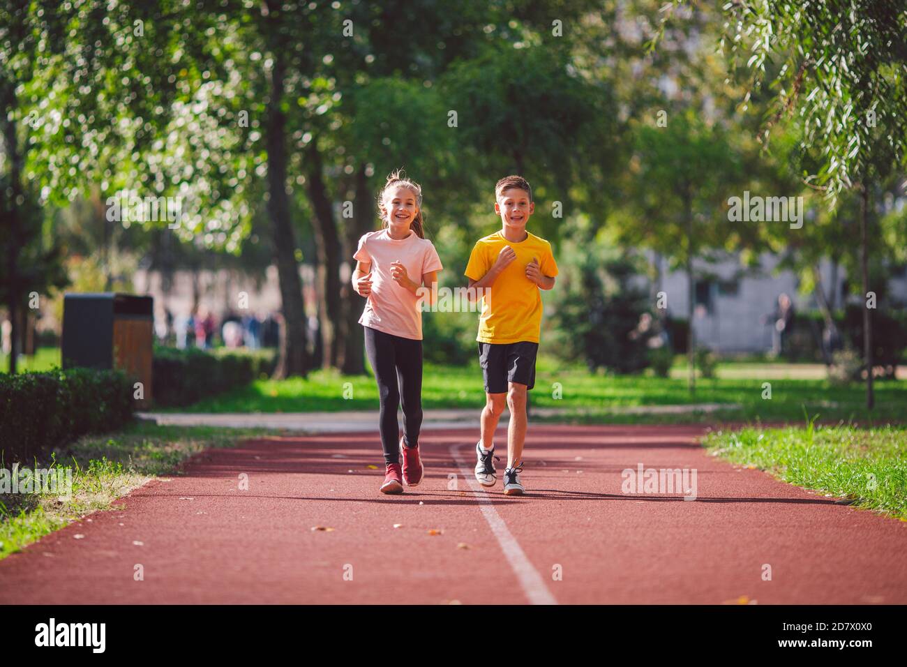 Kids run. Healthy sport. Child sport, heterosexual twins running on ...