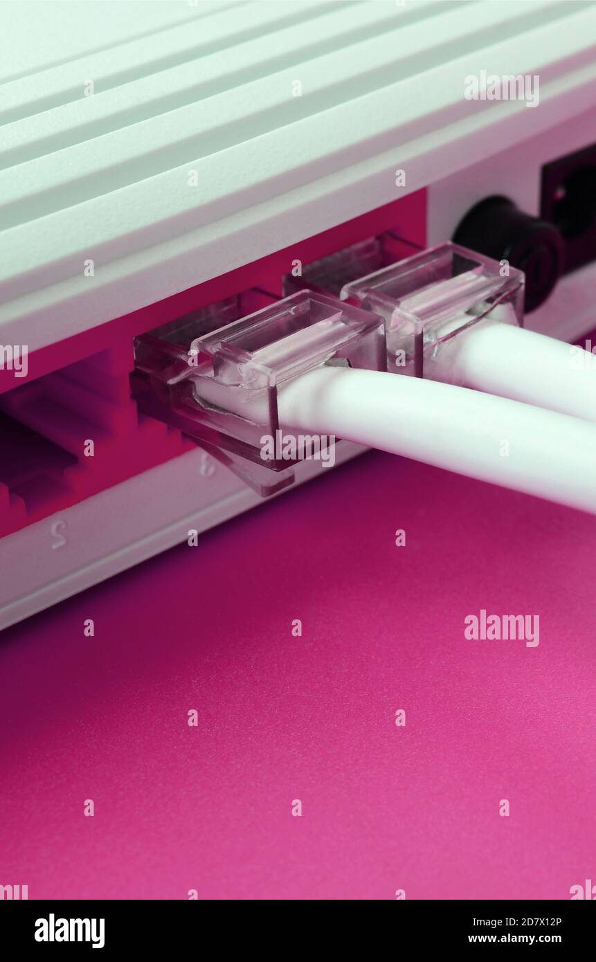 The Internet cable plugs are connected to the Internet router, which ...