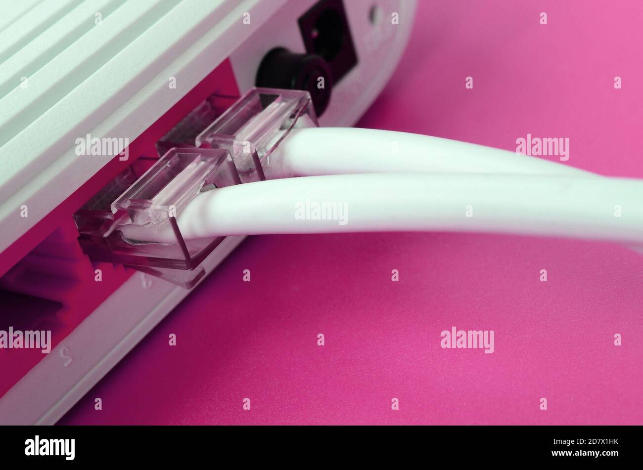 The Internet cable plugs are connected to the Internet router, which ...