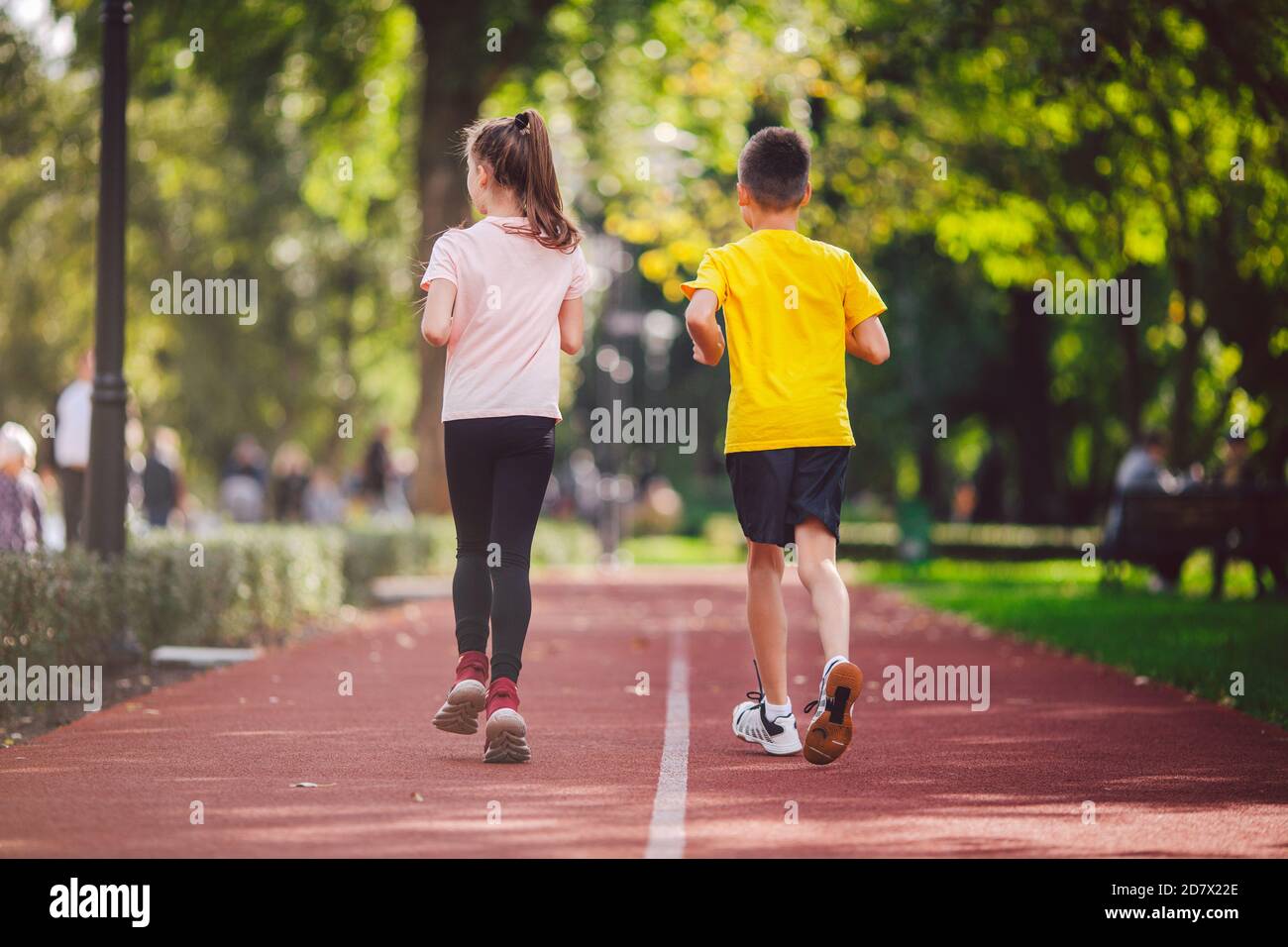 Kids run. Healthy sport. Child sport, heterosexual twins running on ...