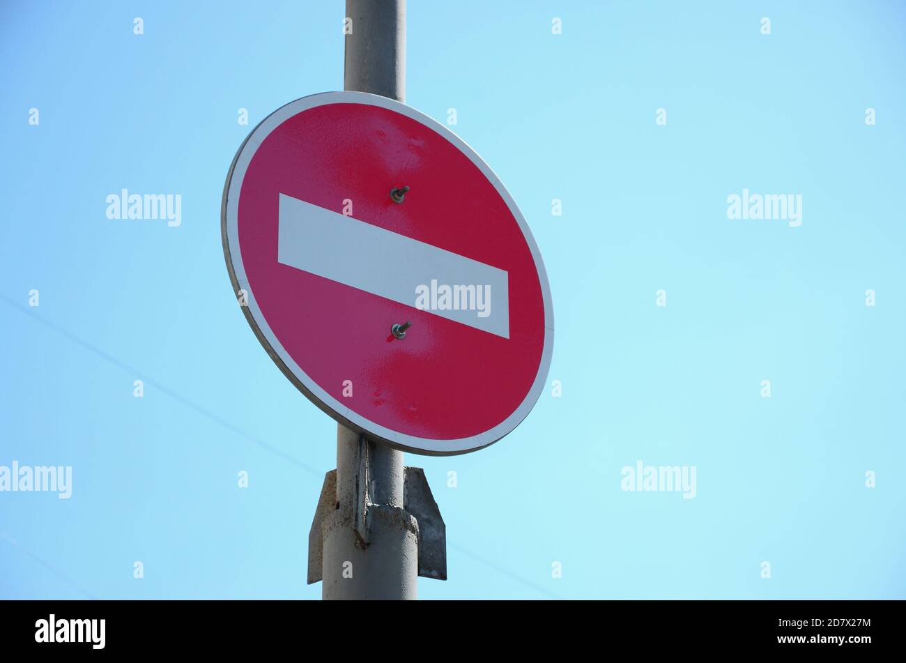 Road sign in the form of a white rectangle in a red circle. No entry ...