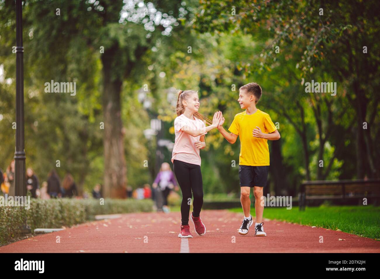 Kids run. Healthy sport. Child sport, heterosexual twins running on ...
