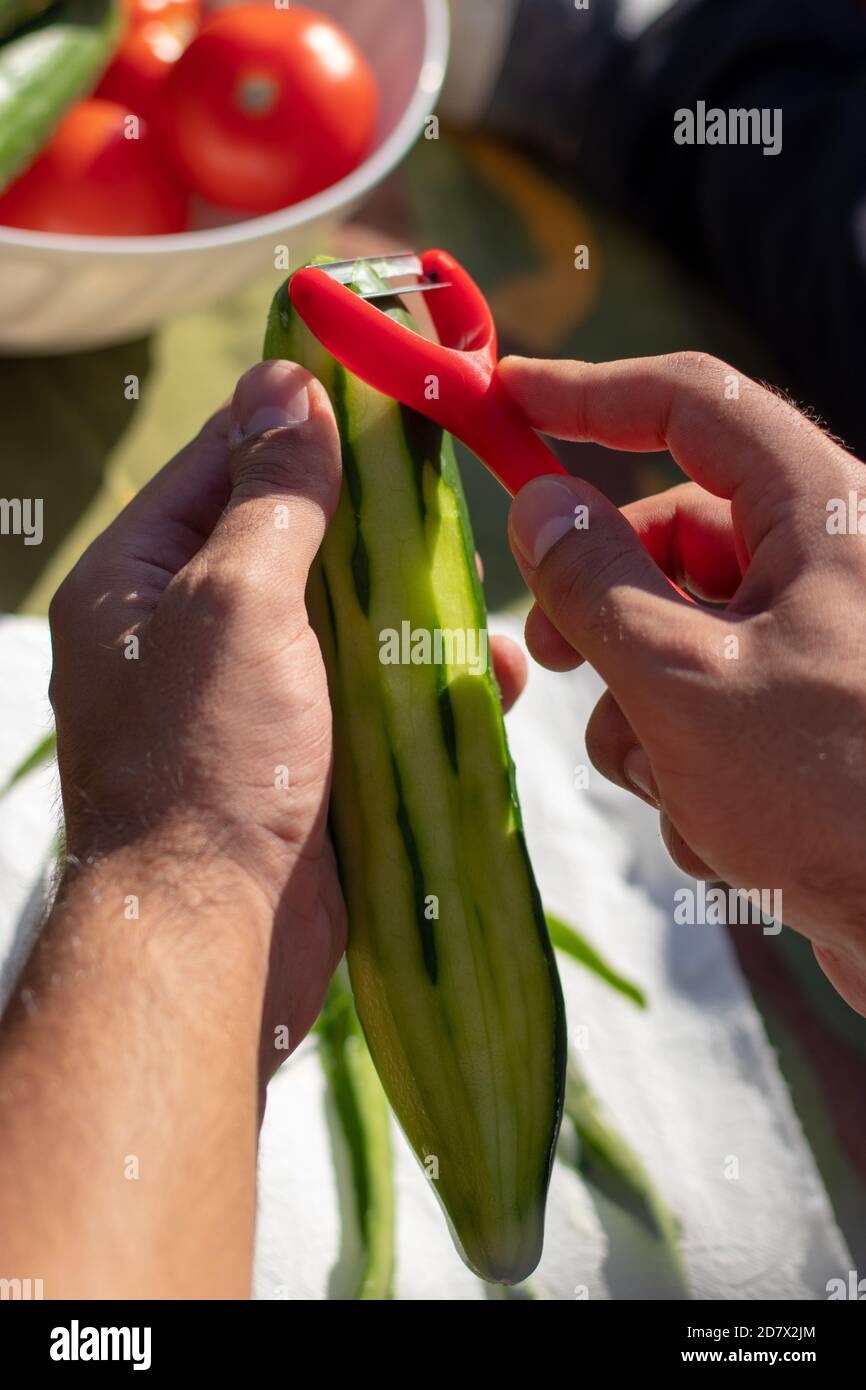 Peeling a cucumber hi-res stock photography and images - Alamy