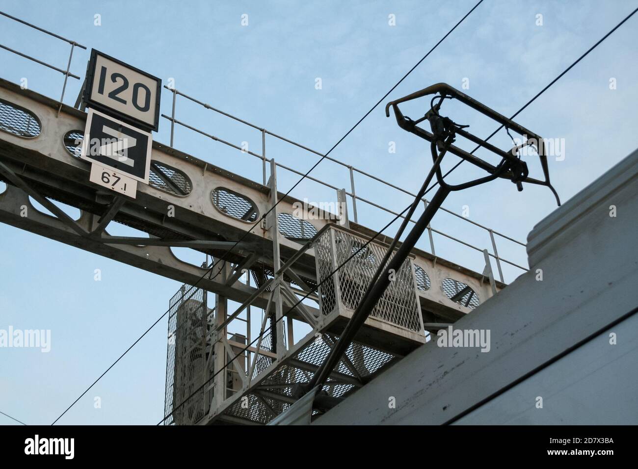 Pantograph of French railways train captating electricty from a ...