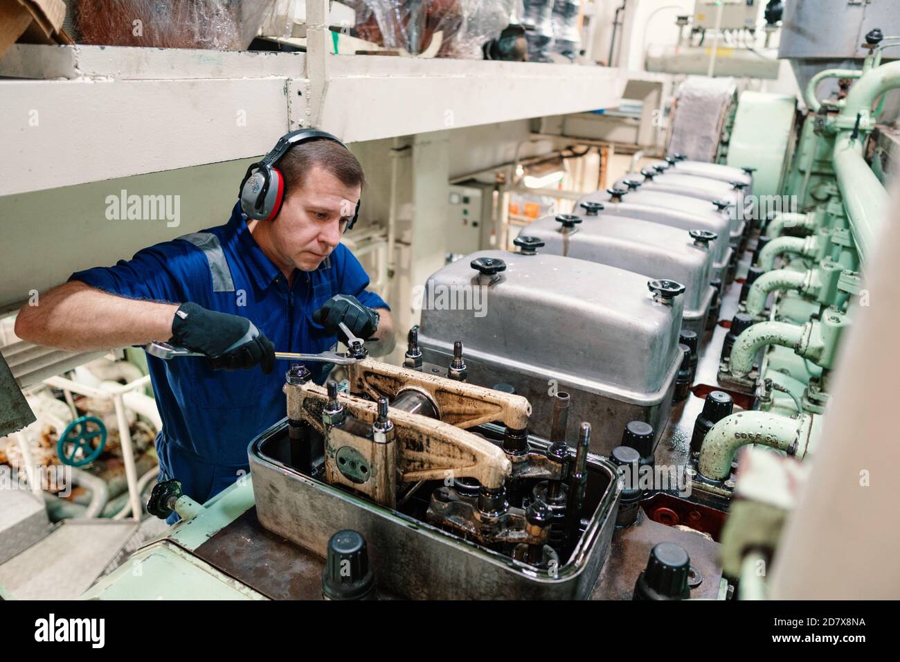 Marine engineer officer controlling vessel enginesand propulsion in ...