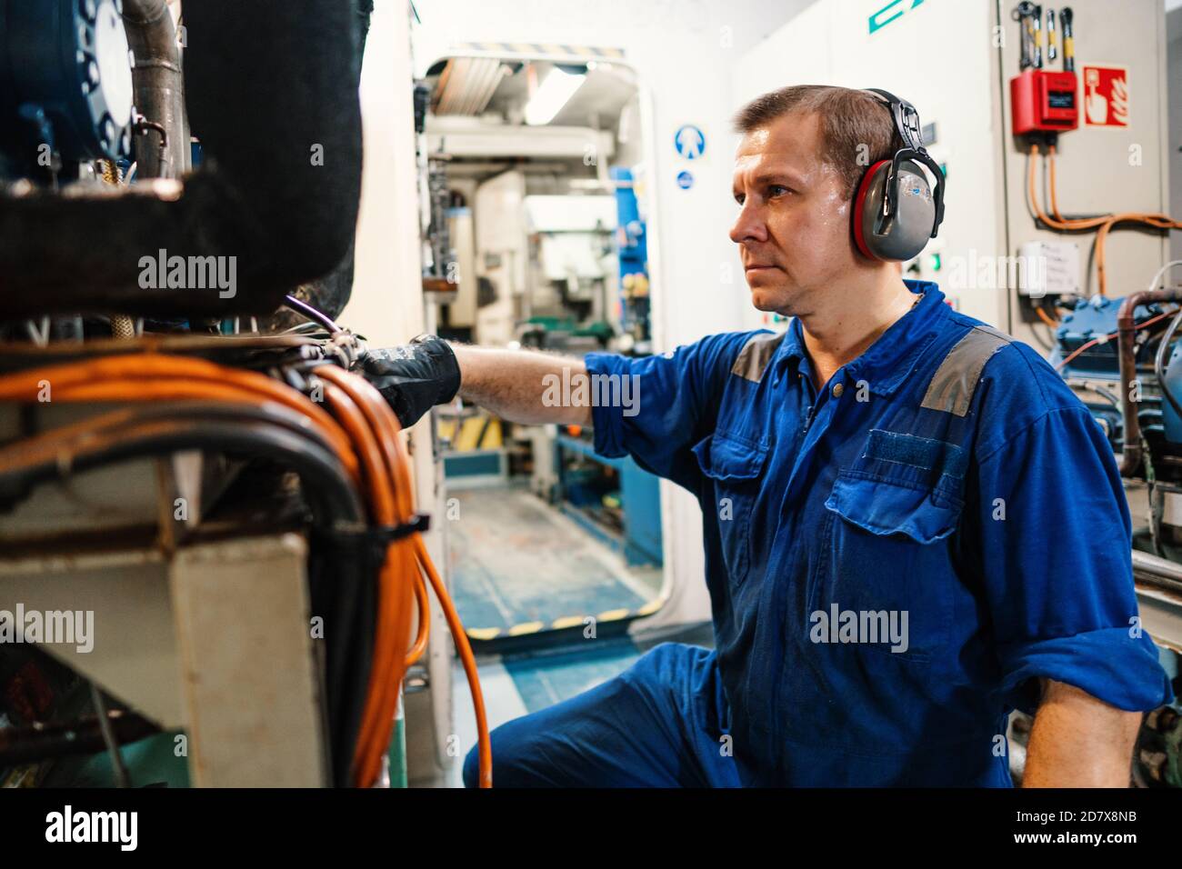 Marine engineer officer controlling vessel enginesand propulsion in ...