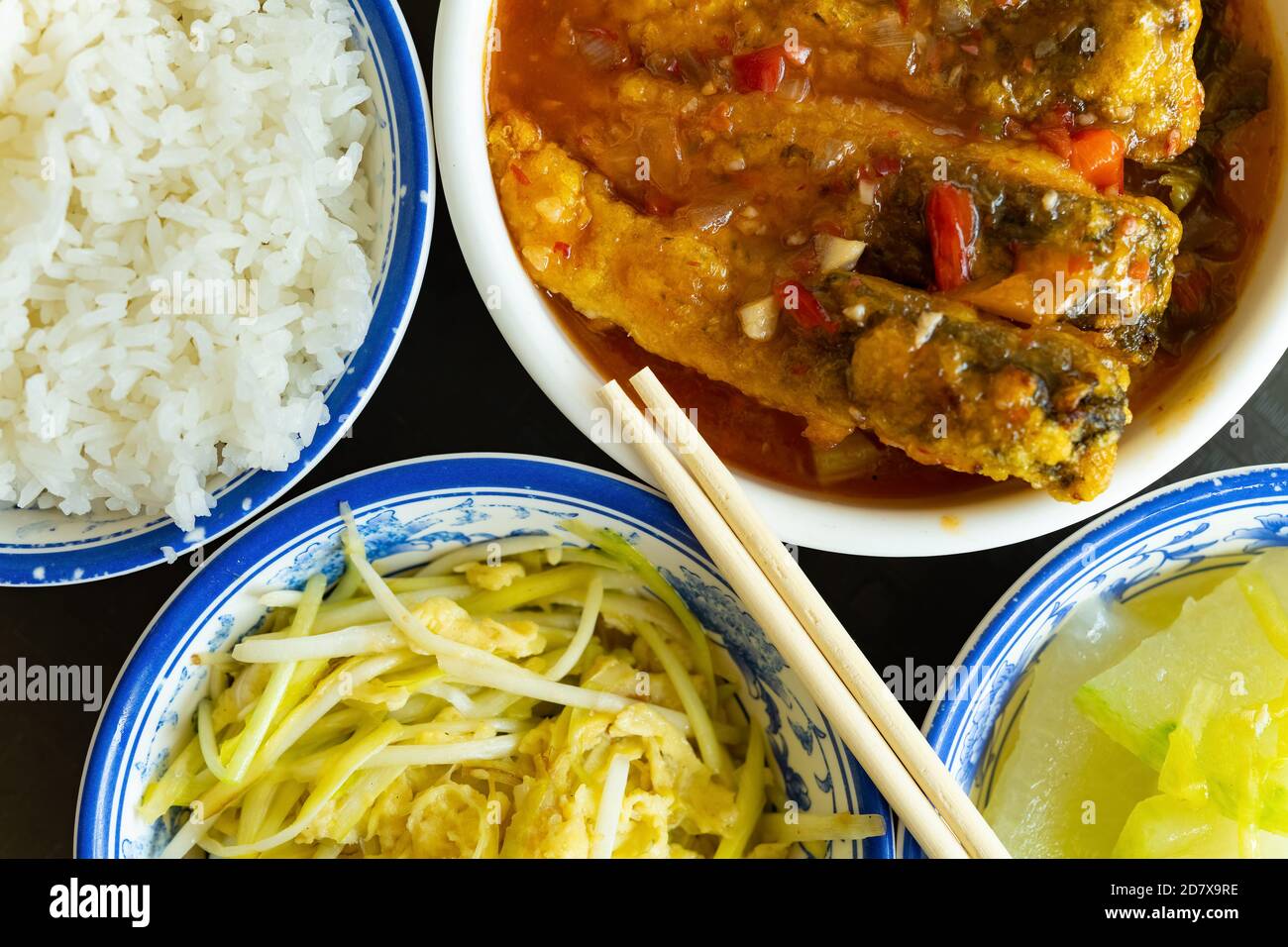 top view scrambled eggs with hotbed chives and deep fried fish and ...