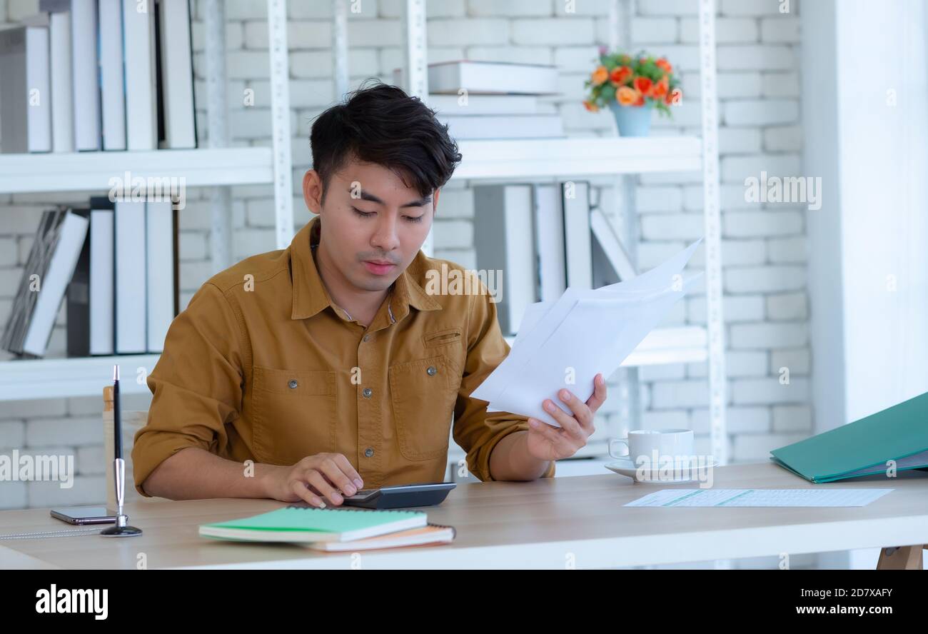 Asia man working at home Stock Photo - Alamy