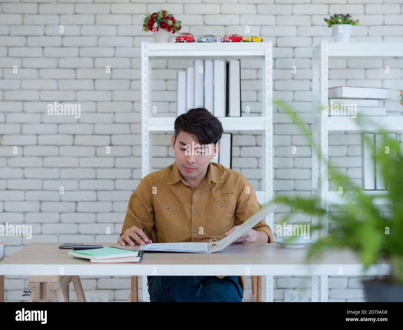 Asia man working at home Stock Photo - Alamy