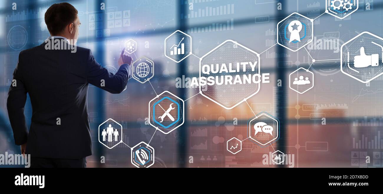 QA Businessman pressing Quality assurance button on virtual screens ...