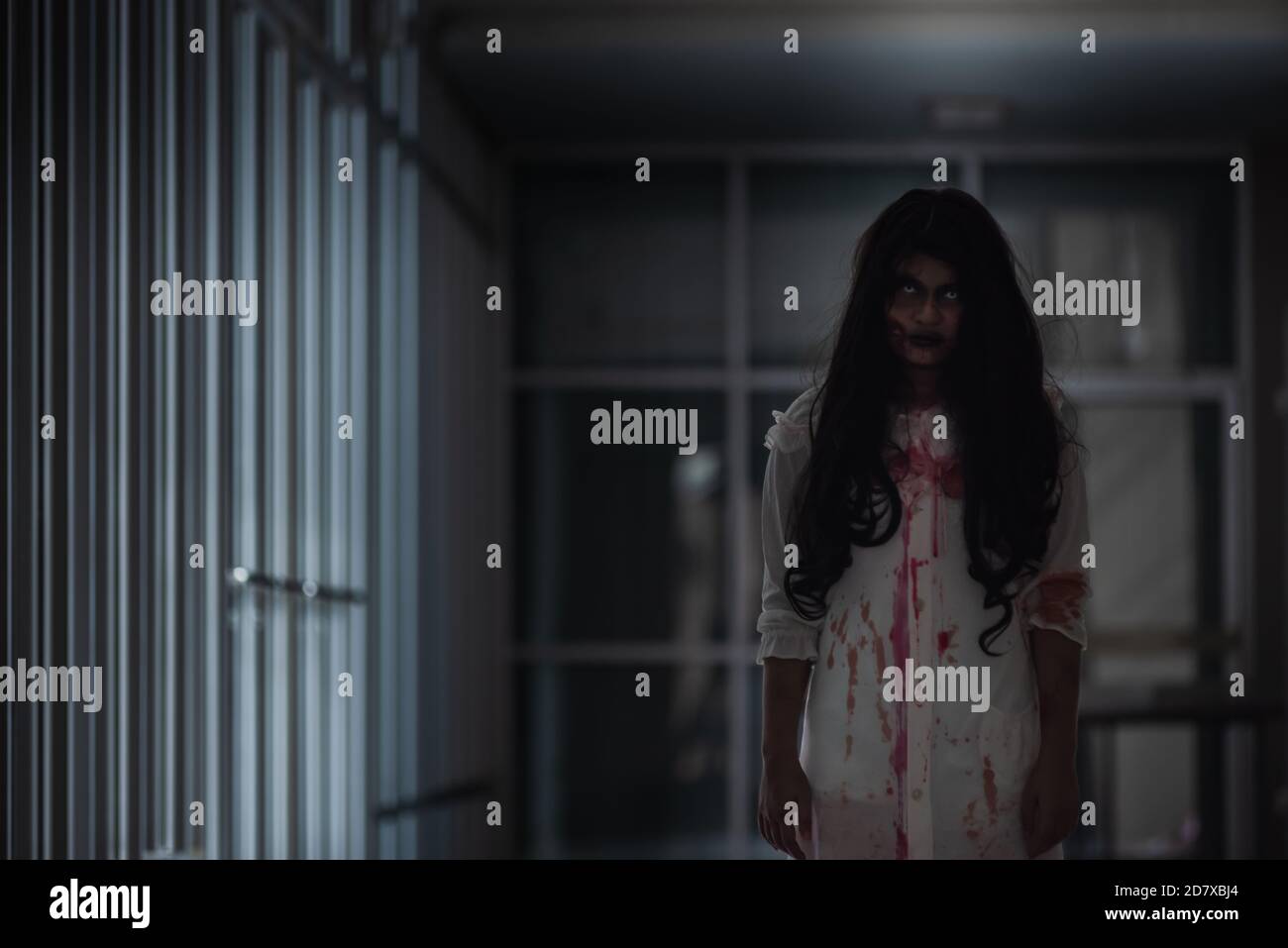 Horror evil woman ghost creepy in a dark room at house. The female ...