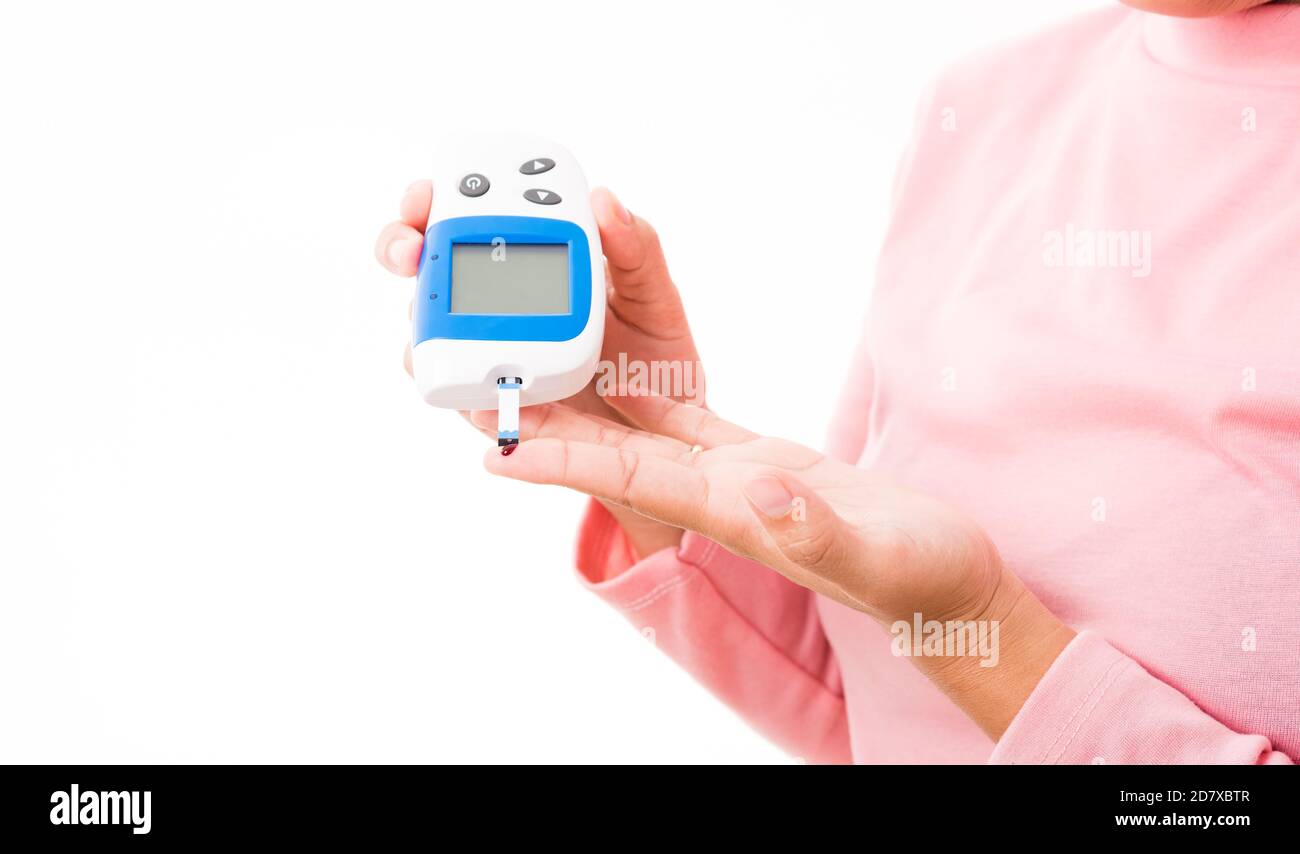 Closeup hands woman measur glucose test level check with blood on ...