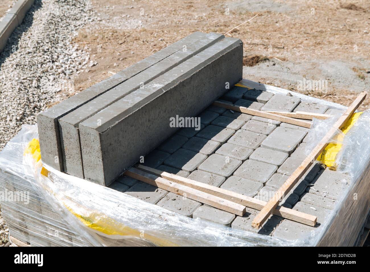 Road tiles stacked on top of each other. Gray concrete paving slabs are ...