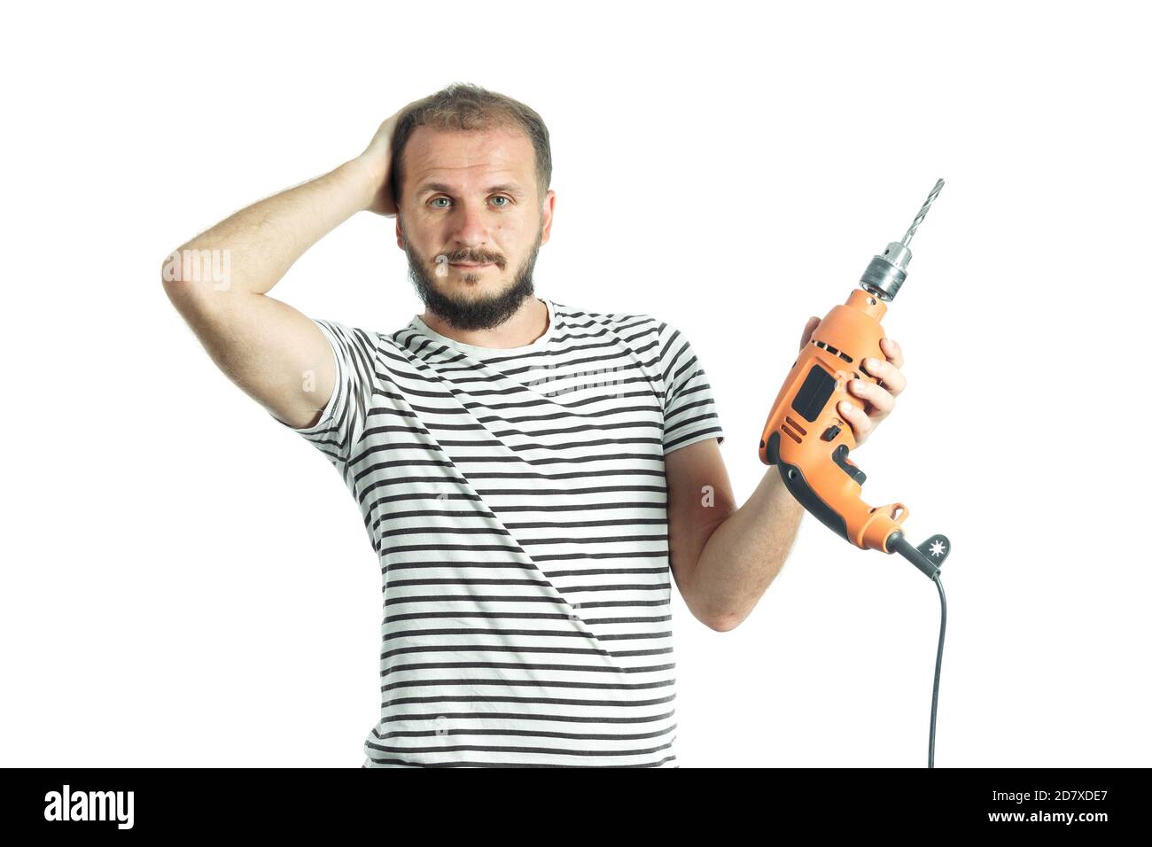 Perplexity builder handy man is hold a power tool - electic drill or ...