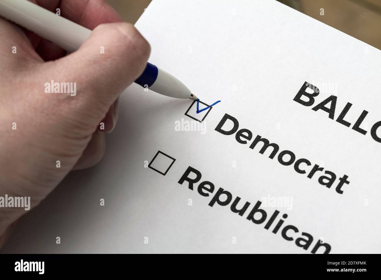 Checklist concept. Voter votes for Democrat on the ballot. A checkmark ...