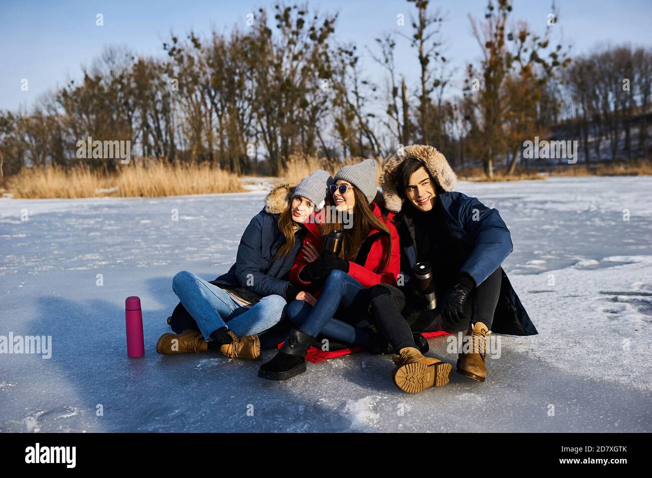 Young friends having fun outdoors in winter time. Concept of friendship ...