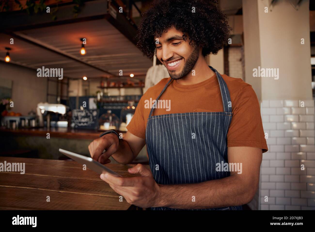 Happy waiter hi-res stock photography and images - Alamy