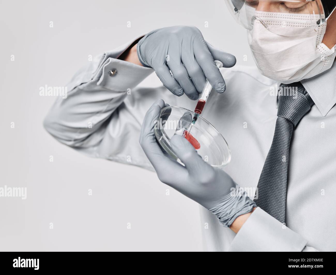 A man in a medical mask blood test for a coronavirus Stock Photo - Alamy