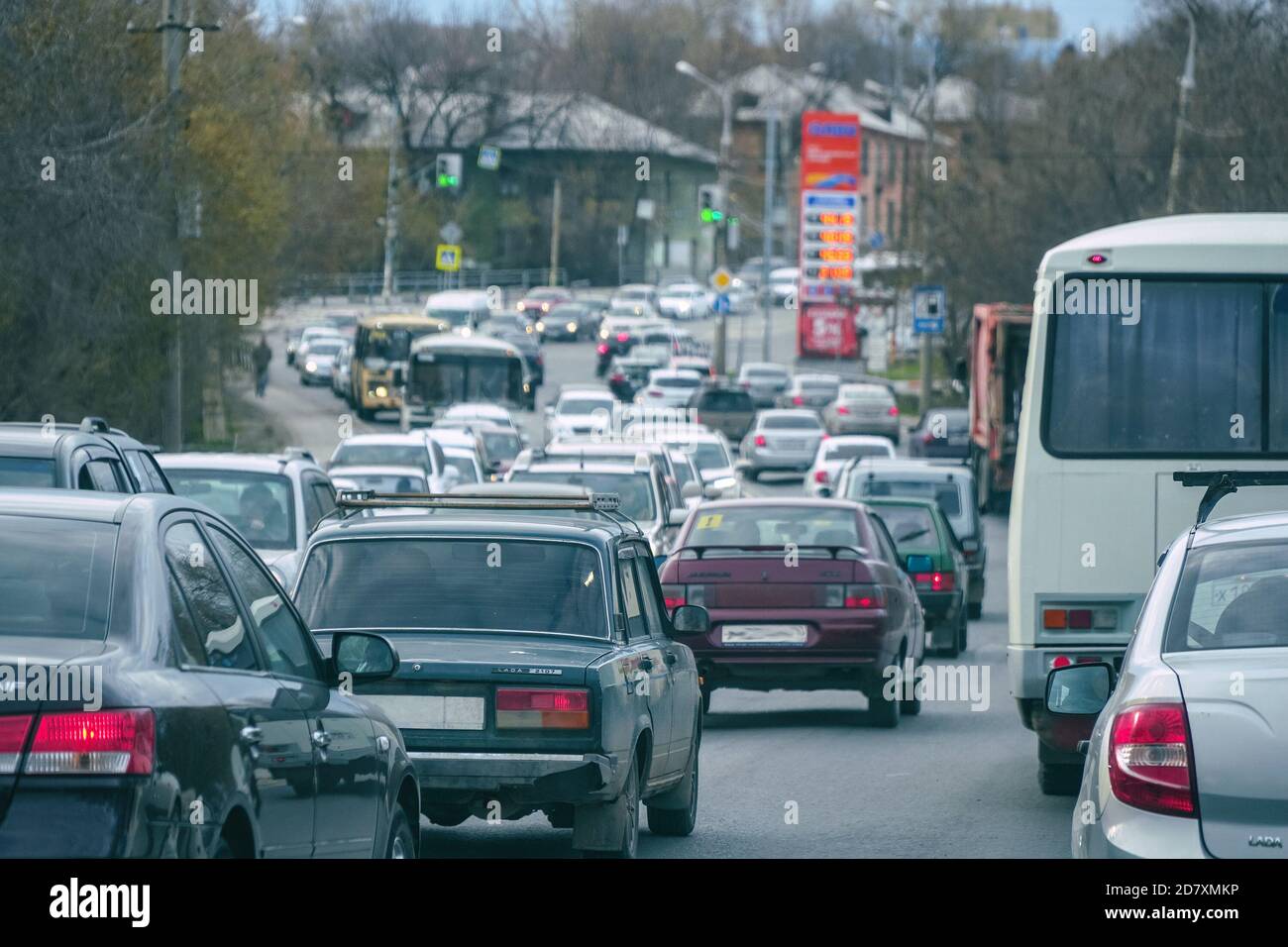 Cars standing in a traffic jam on city street Stock Photo - Alamy