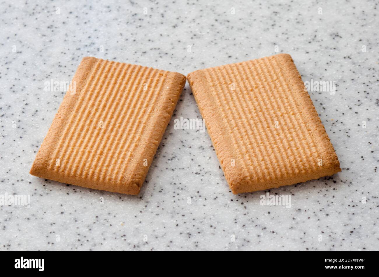 Rectangular shortbread cookies on a light marble top. Homemade baking ...