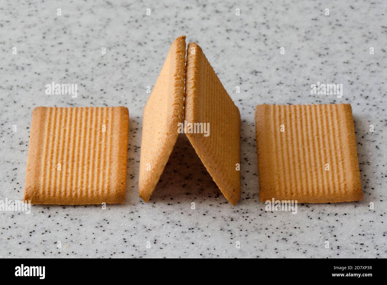 Rectangular shortbread cookies on a light marble top. Homemade baking ...