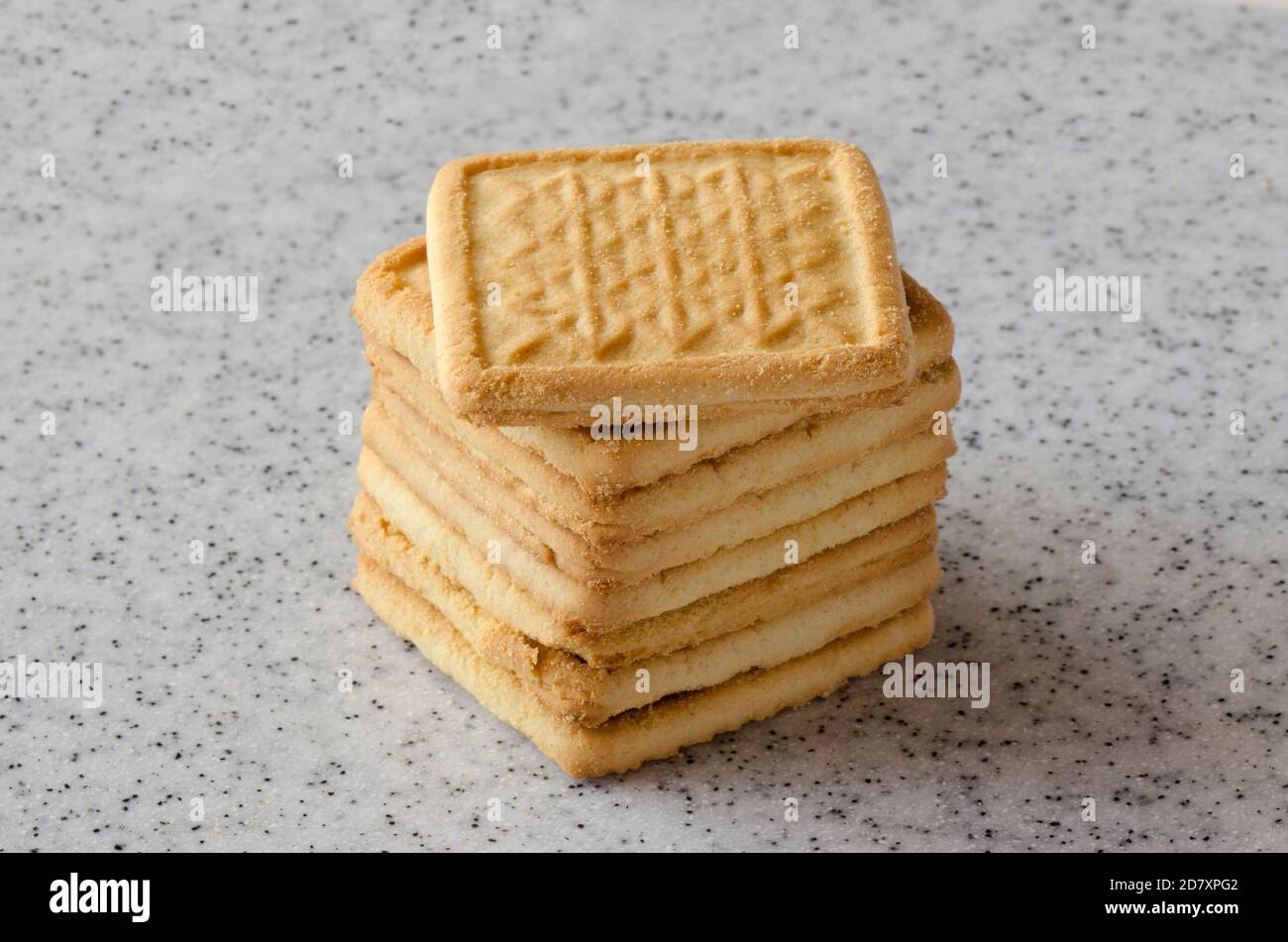 Rectangular shortbread cookies on a light marble top. Homemade baking ...