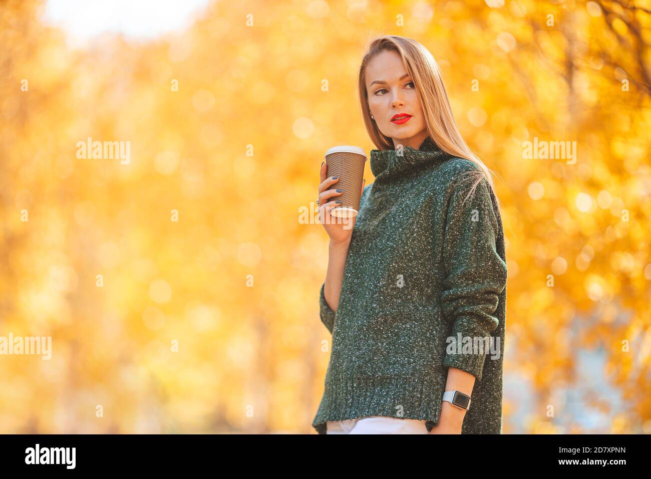 Fall concept - beautiful woman in autumn park under fall foliage Stock ...