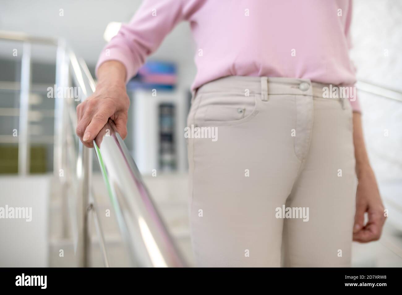Figure going up stairs hi-res stock photography and images - Alamy