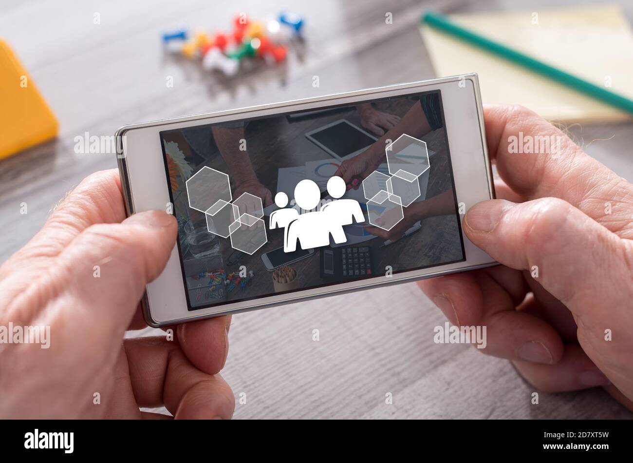 Business partner concept on mobile phone Stock Photo - Alamy