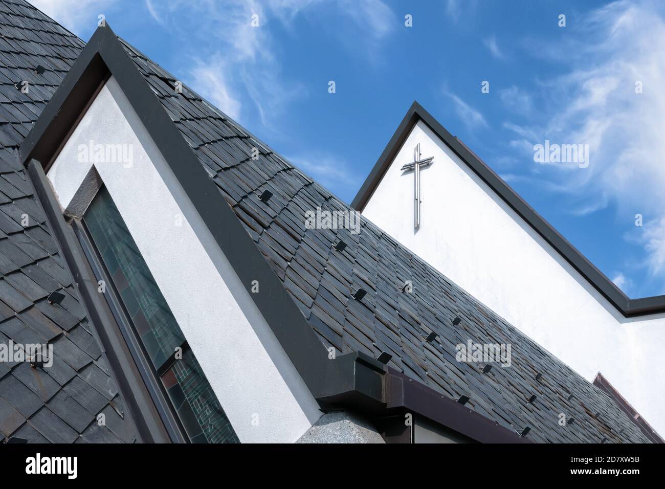 Particular roof of an Italian Catholic church. Church roof with angelic ...