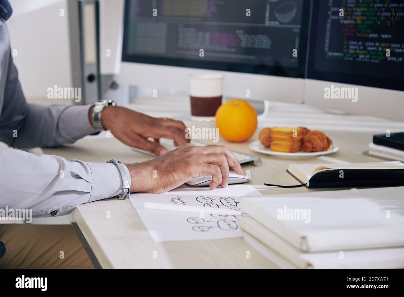 Software developer working on computer Stock Photo - Alamy