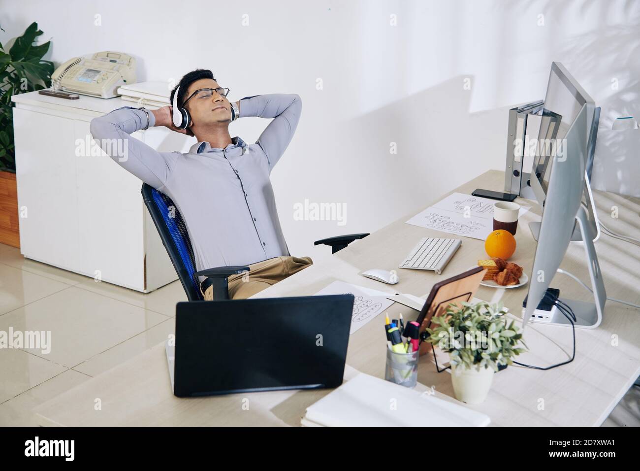 Satisfied Indian programmer Stock Photo - Alamy