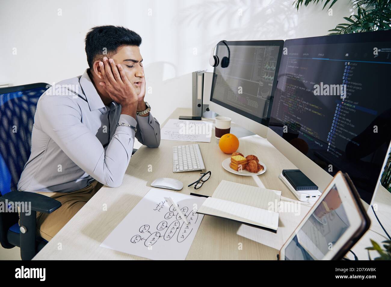 Almost sleeping programmer Stock Photo - Alamy