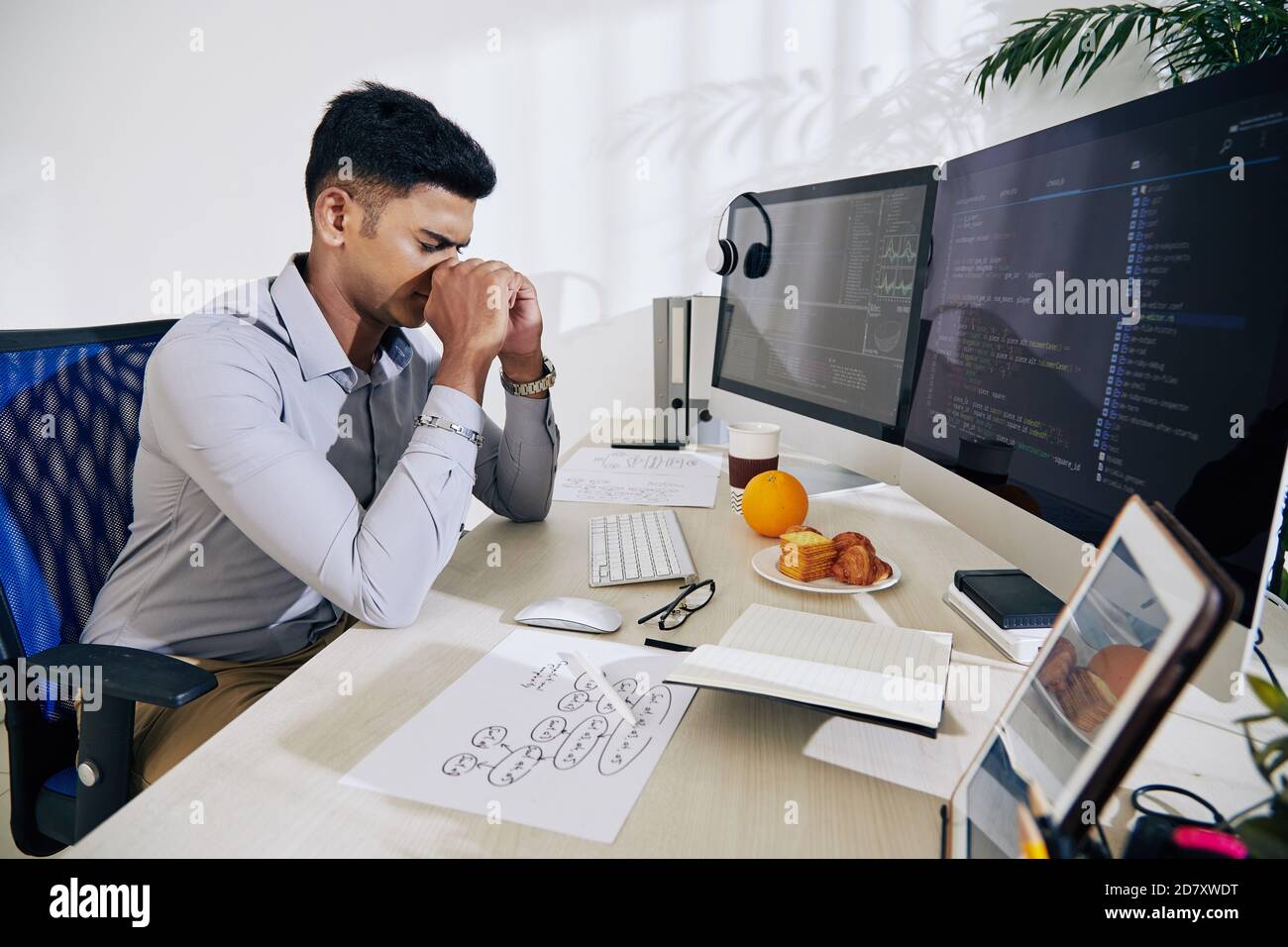 Tired programmer computer working office hi-res stock photography and ...