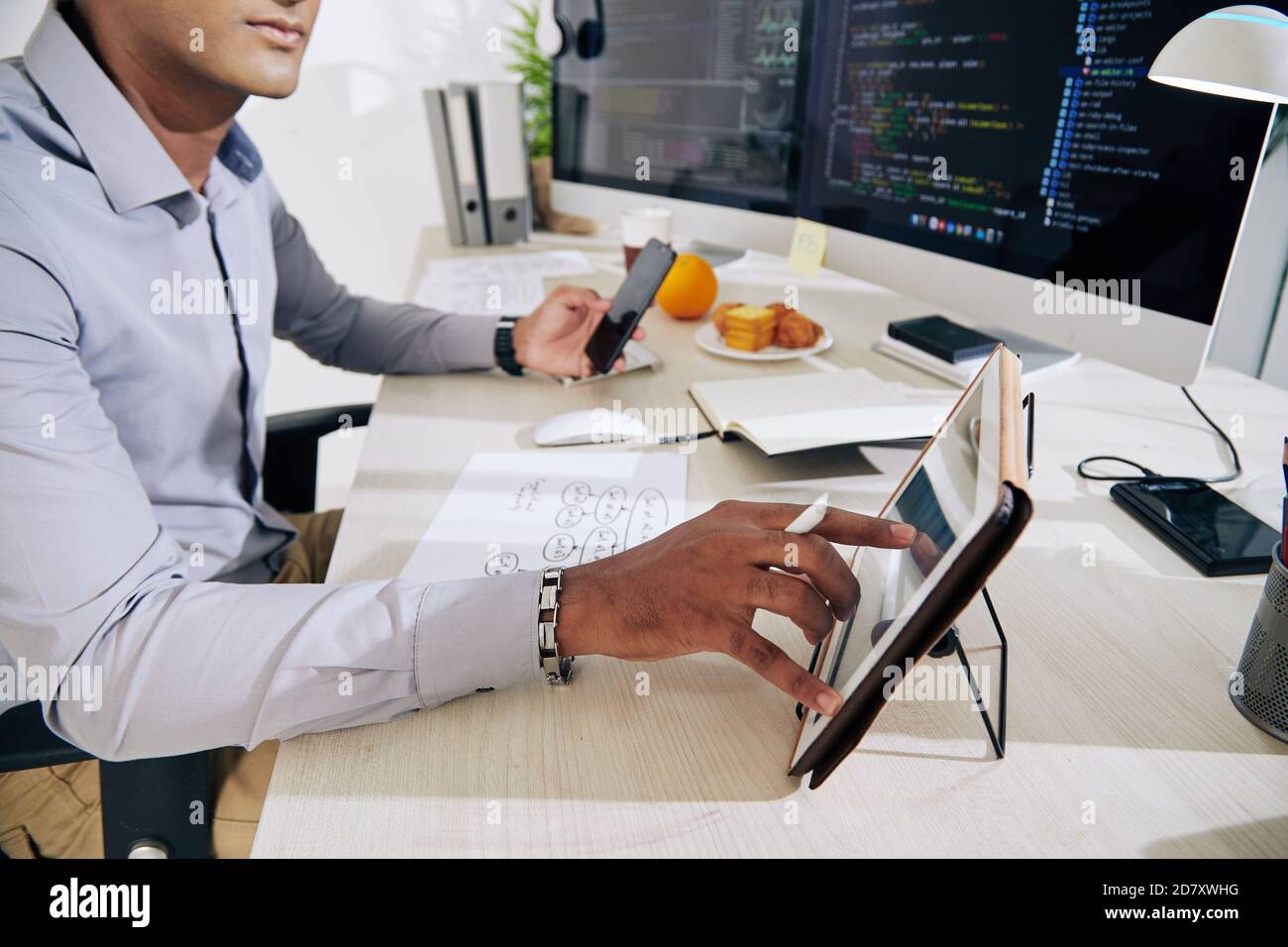 Software developer checking data Stock Photo - Alamy