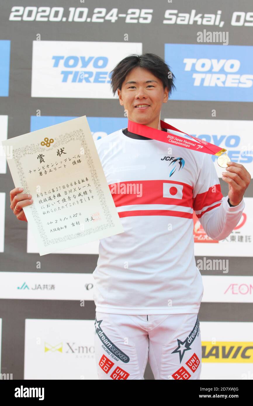 Yoshitaku Nagasako celebrates on the podium after winning the 2020 ...