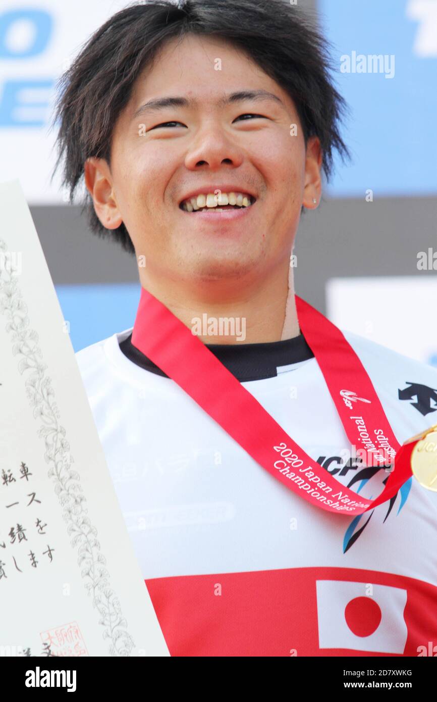 Yoshitaku Nagasako celebrates on the podium after winning the 2020 ...