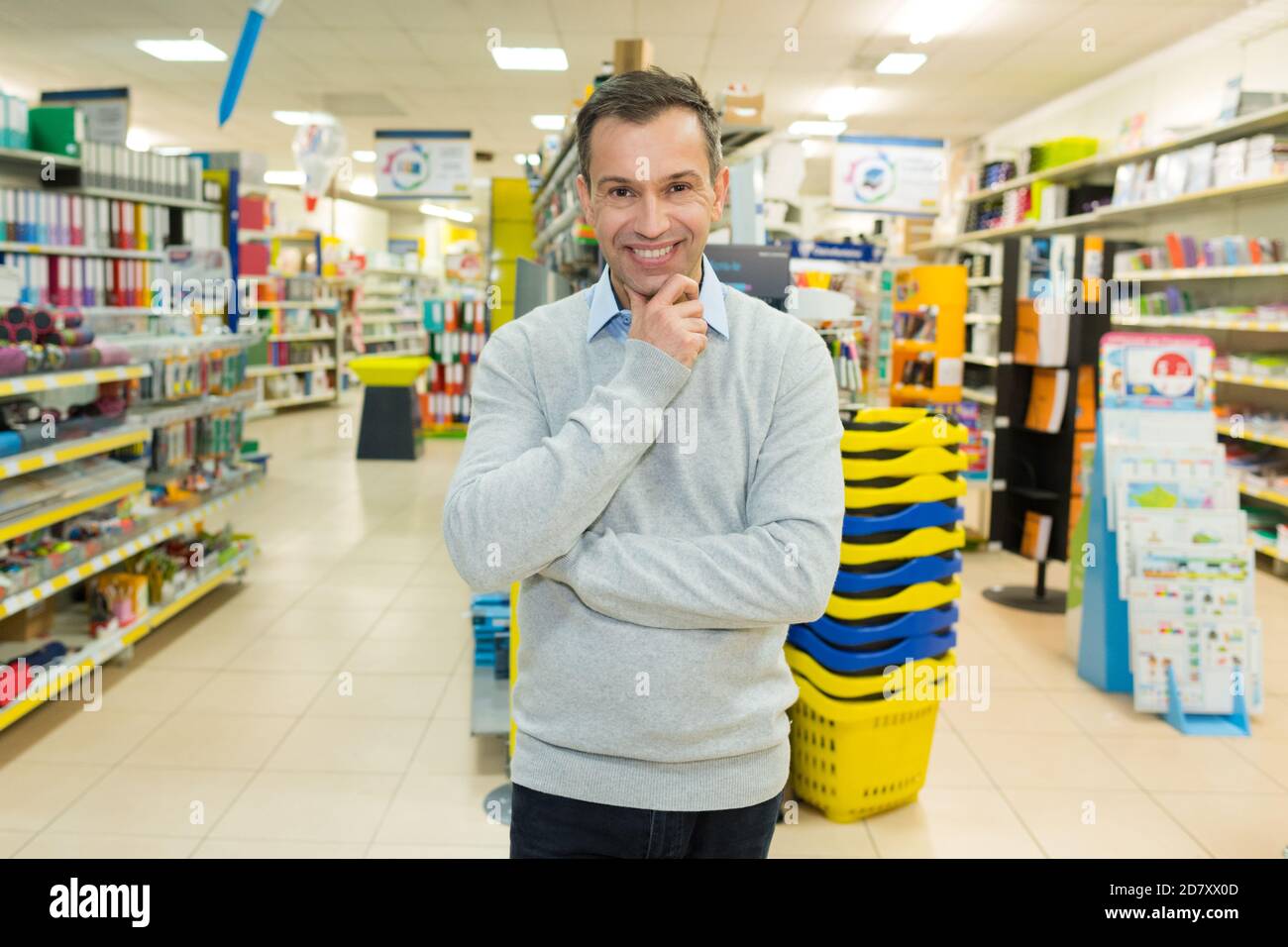 handsome man shopping in a supermarket Stock Photo - Alamy
