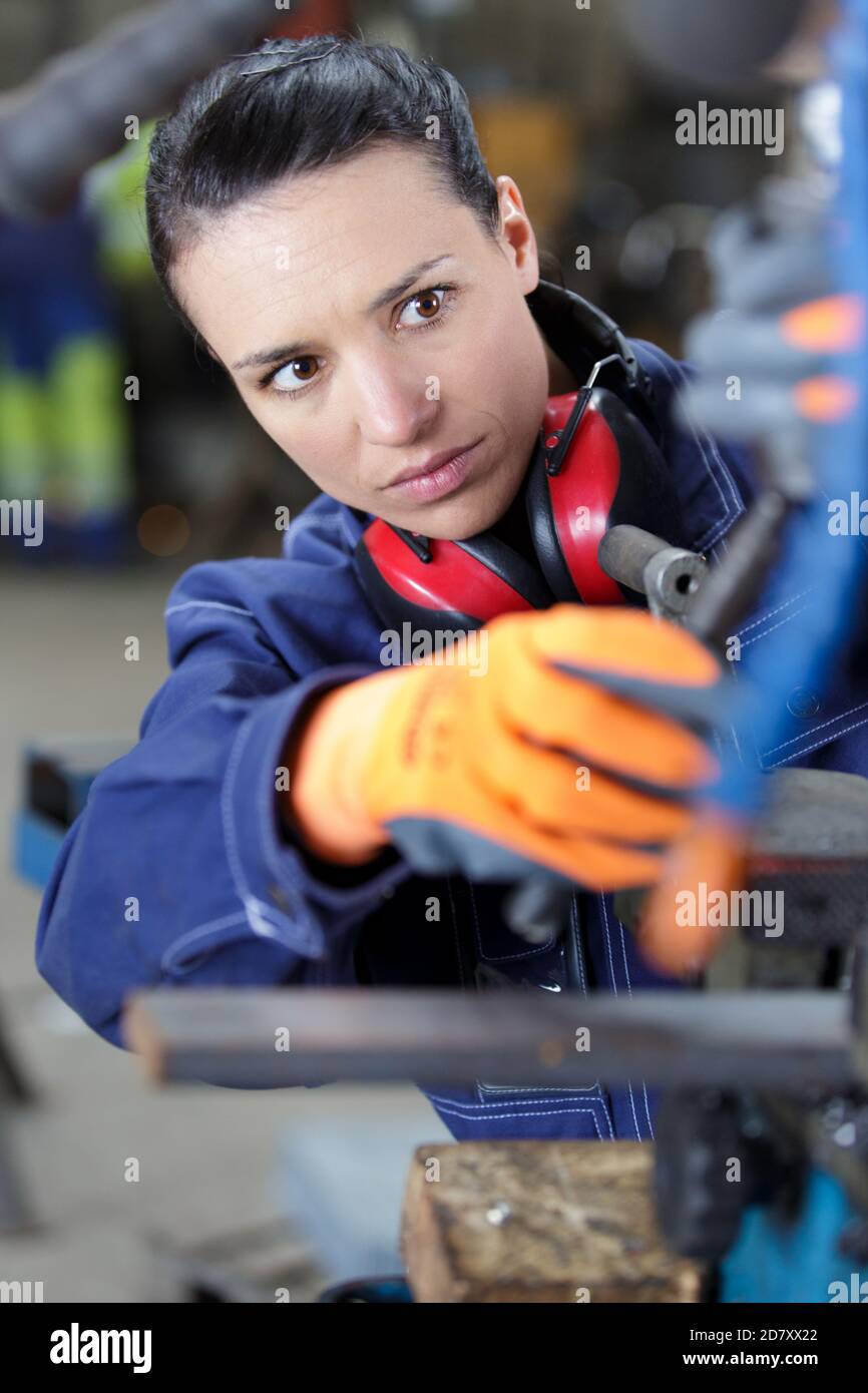 female factory worker in production factory Stock Photo - Alamy