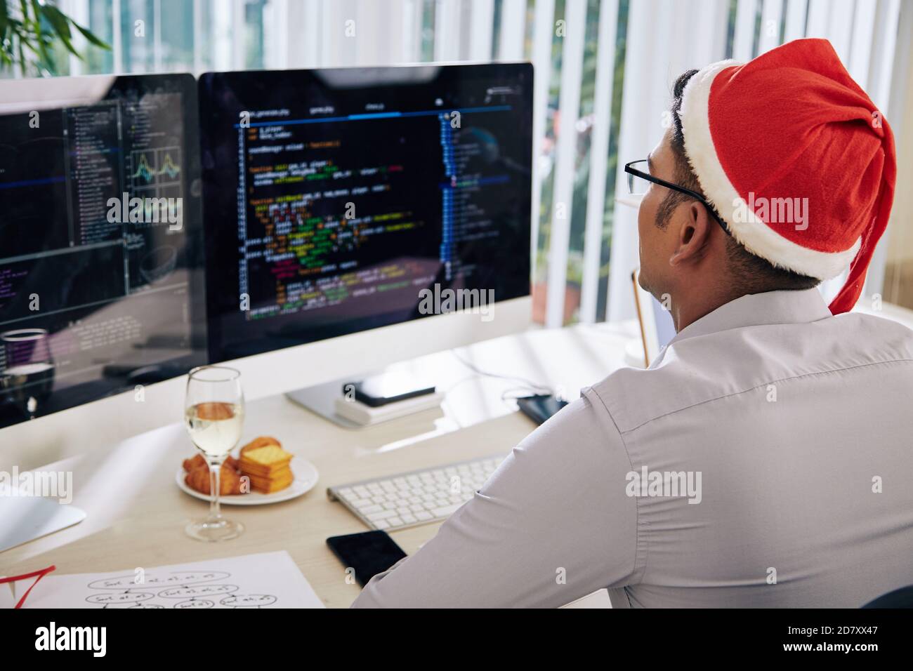 Working in office on Christmas eve Stock Photo - Alamy