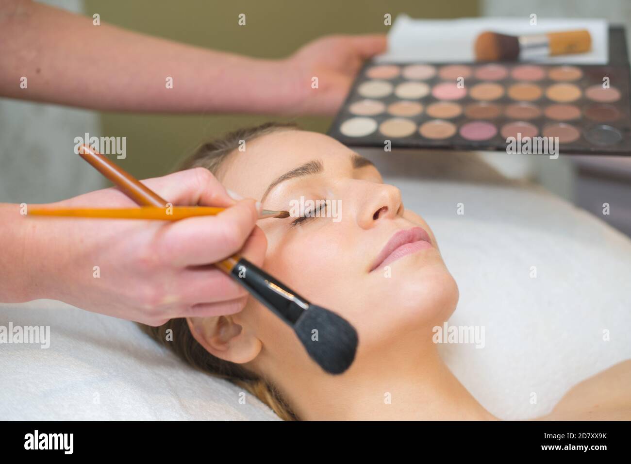 a woman being made up Stock Photo - Alamy
