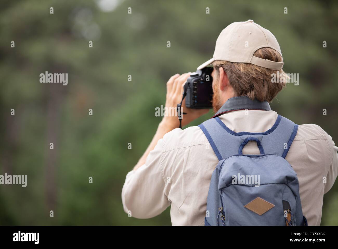 Rear shot male taking photo hi-res stock photography and images - Alamy