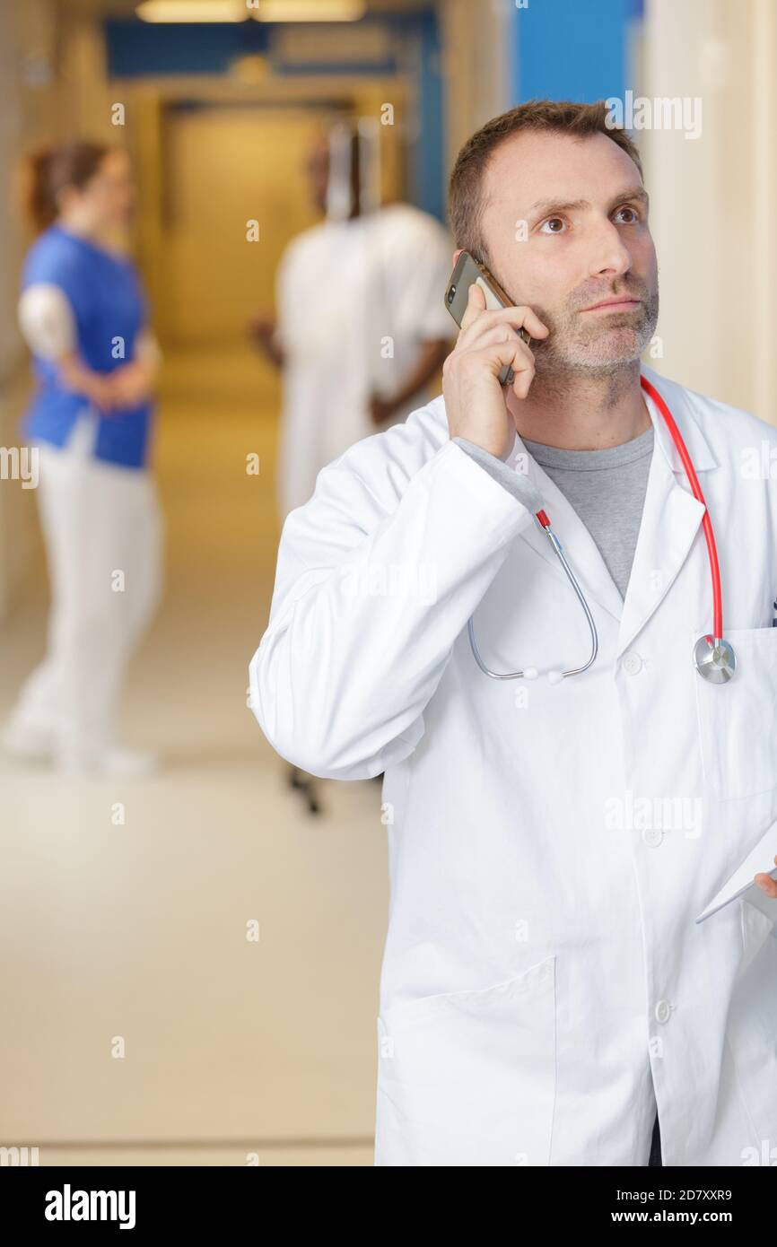 Surgeon talking on his mobile phone hi-res stock photography and images ...