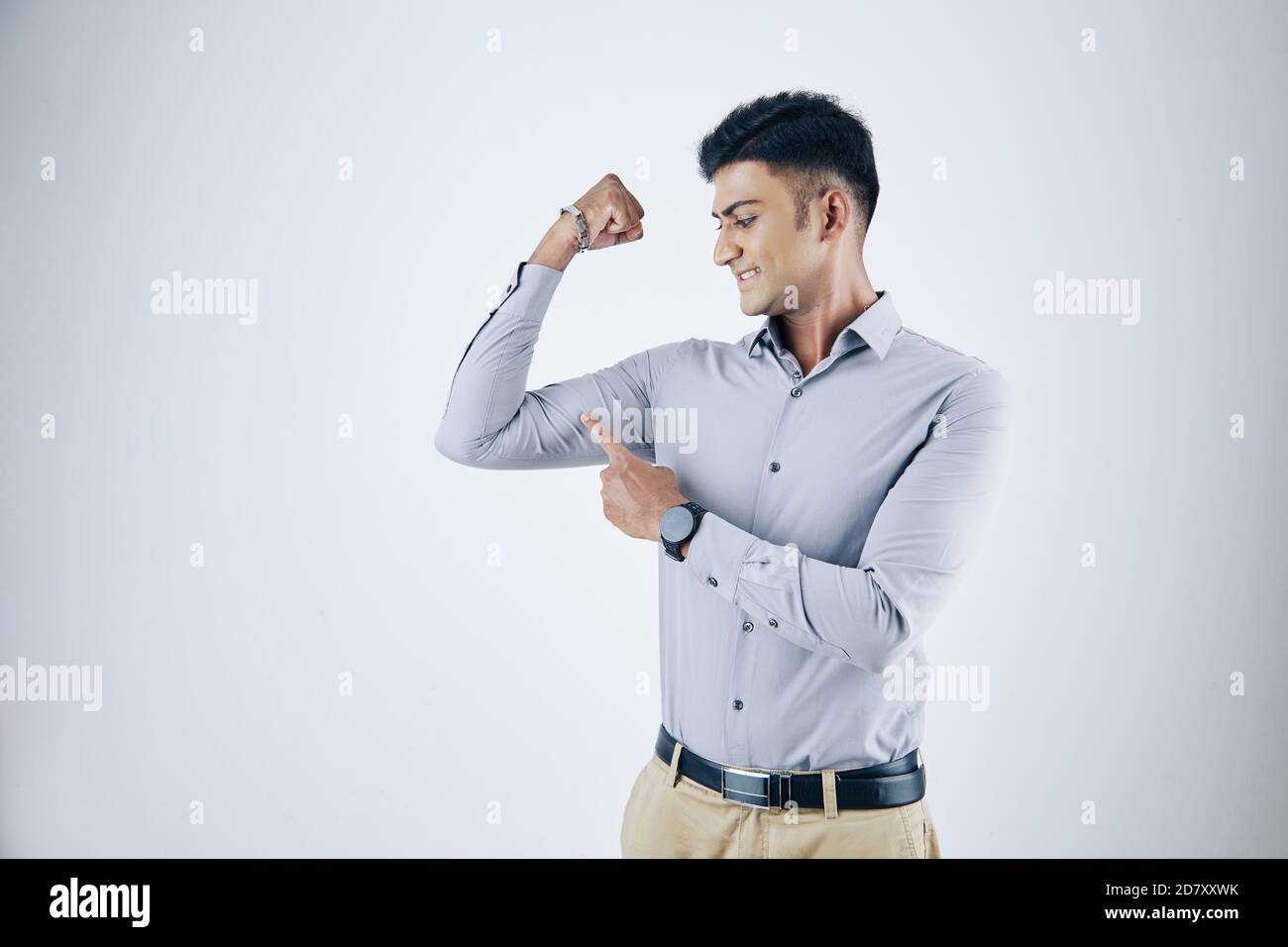 Men showing muscles hi-res stock photography and images - Alamy