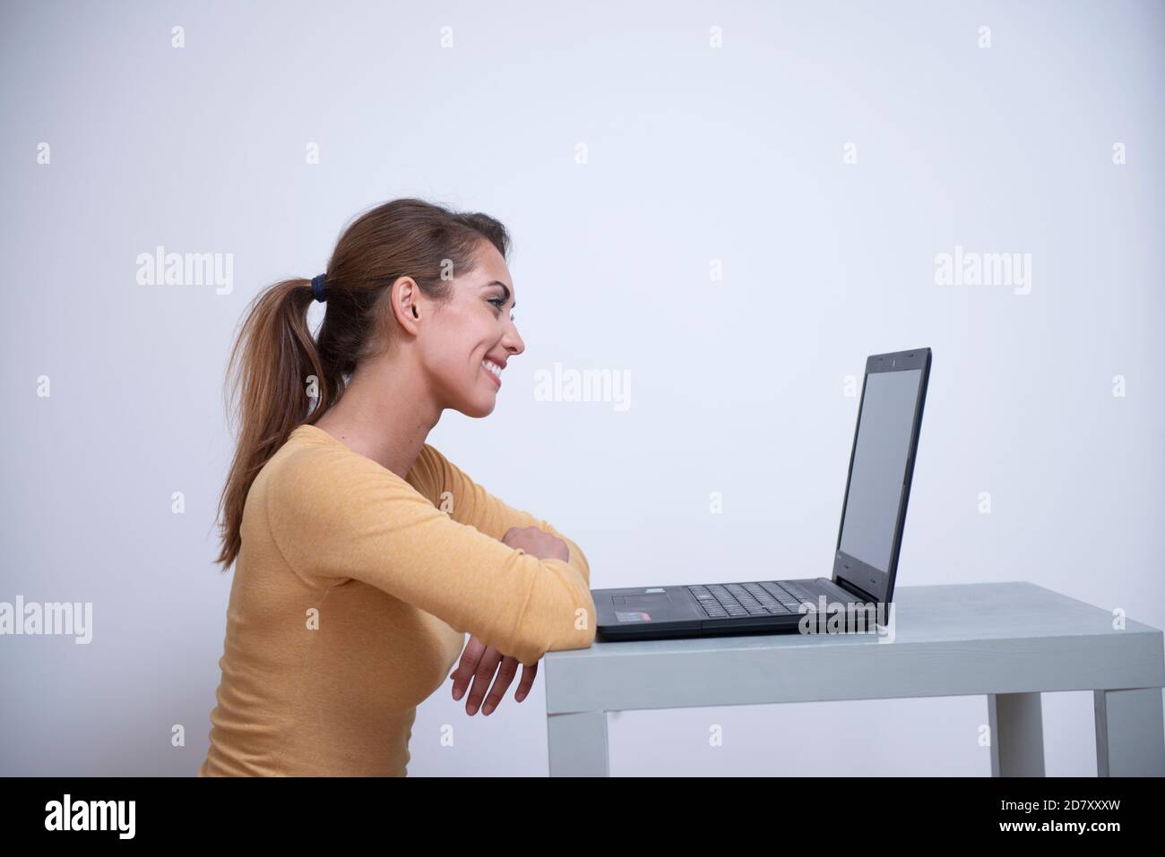 Young girl on her computer Stock Photo - Alamy